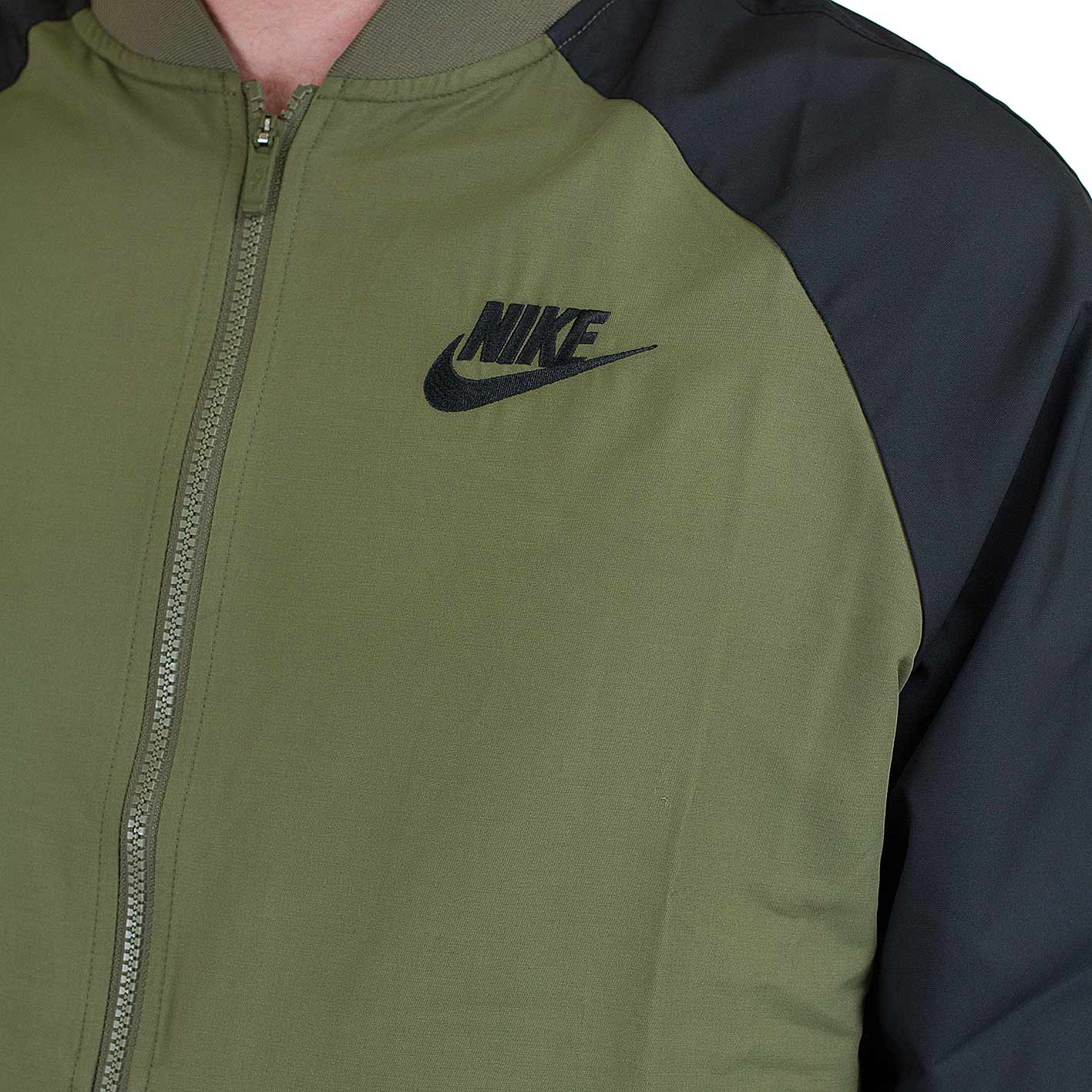 Nike Jacke Woven Players oliv/schwarz - hier bestellen!